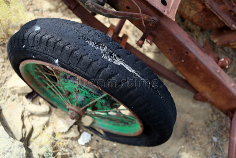 An Old Car Tyre and the Rusted Frame Stock Image - Image of iron ...