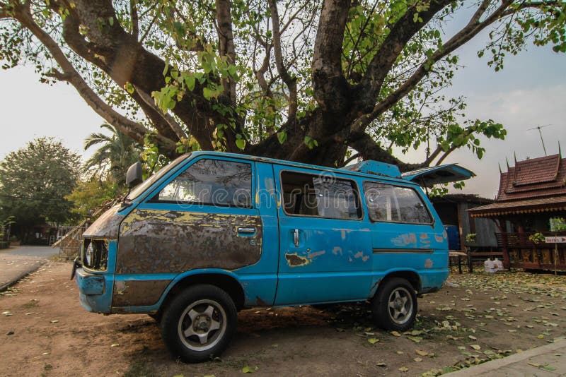 The old car under a tree stock image. Image of large - 71660311