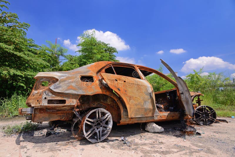 Two rusty burned out cars stock photo. Image of explosion - 107395056