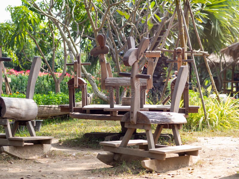 Old carousel made of wood stock photo. Image of ancient - 239177144