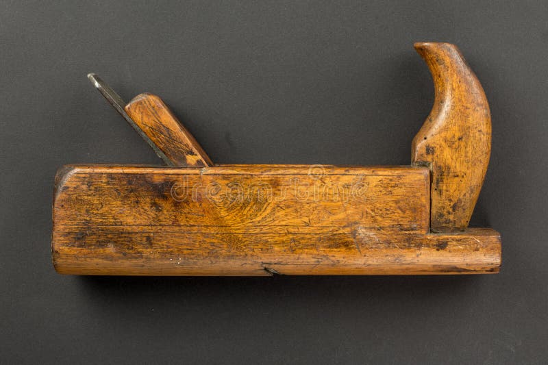 Old Carpenter Tool Wood Plane on a Gray Stock Image - Image of hand ...