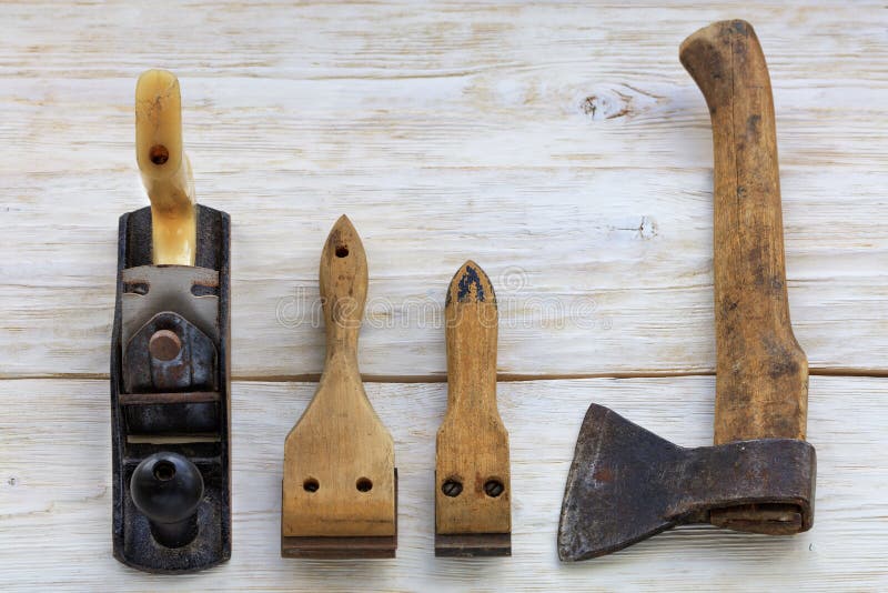 Old Carpentry Tools Lie on a White Wooden Table Stock Image - Image of ...