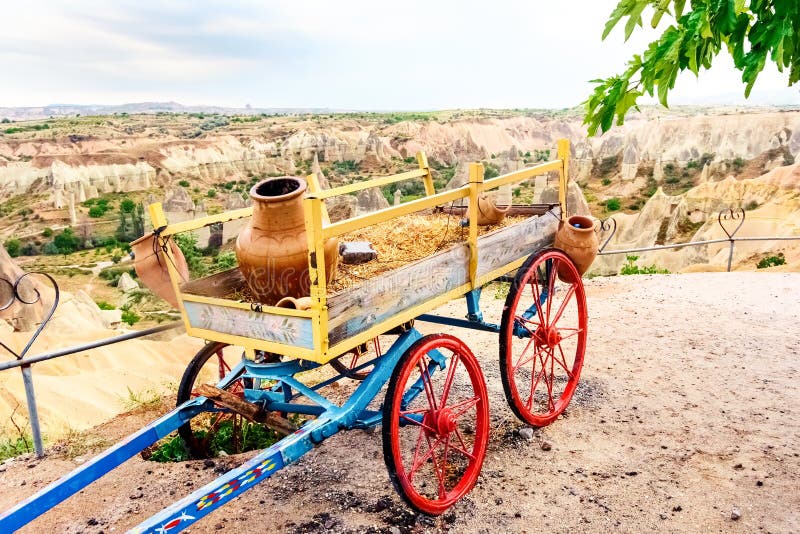 Ancient Cart with Jugs on the Background of the Mountains of Cappadocia ...