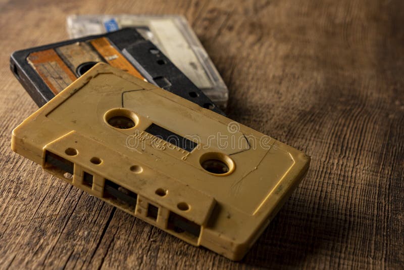 Old Cassette Tapes on a Wooden Table. Stock Photo - Image of play ...