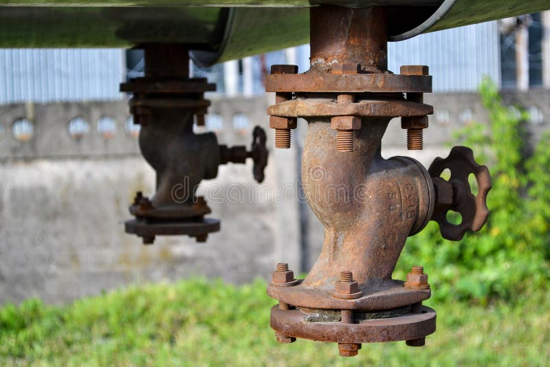 Old Cast Iron Valve on the Pipeline Stock Image - Image of metallic ...