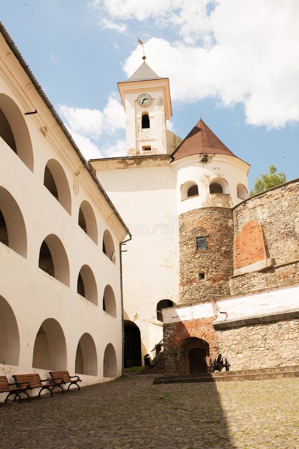 Old Castle with a Clock and Arched Windows Stock Photo - Image of ...