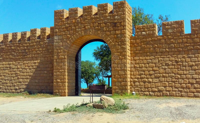 Old Castle Wall with Arc and Olive Trees Inside Stock Photo - Image of ...