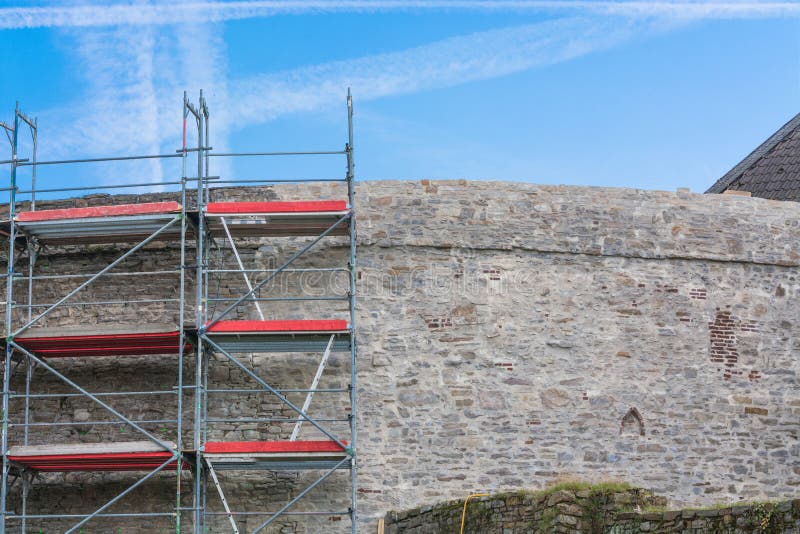 Old Castle Wall with Scaffolding Stock Photo - Image of fixing, ages ...