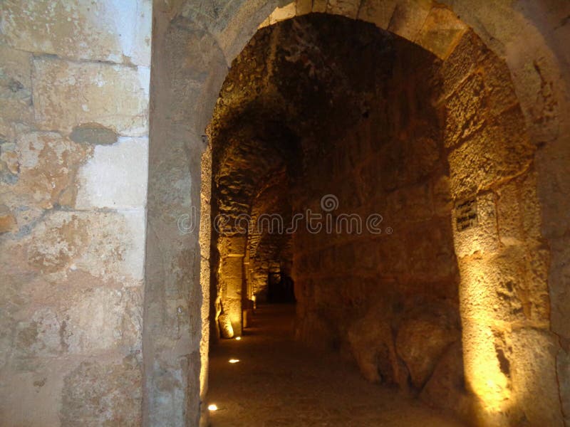 Old catacomb way in a ruin stock image. Image of corridor - 131189197