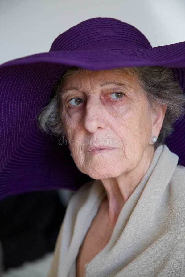 Old Caucasian Woman in a Violet Hat Stock Photo - Image of look ...