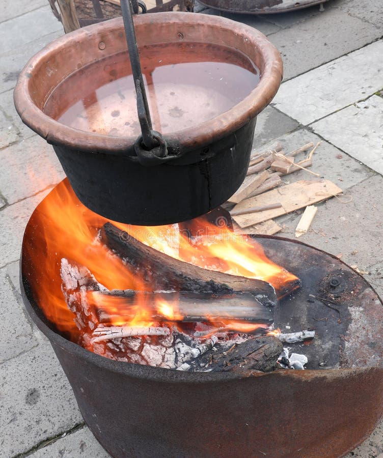 Fire Lit To Boil Water Inside the Large Copper Cauldron during H Stock ...