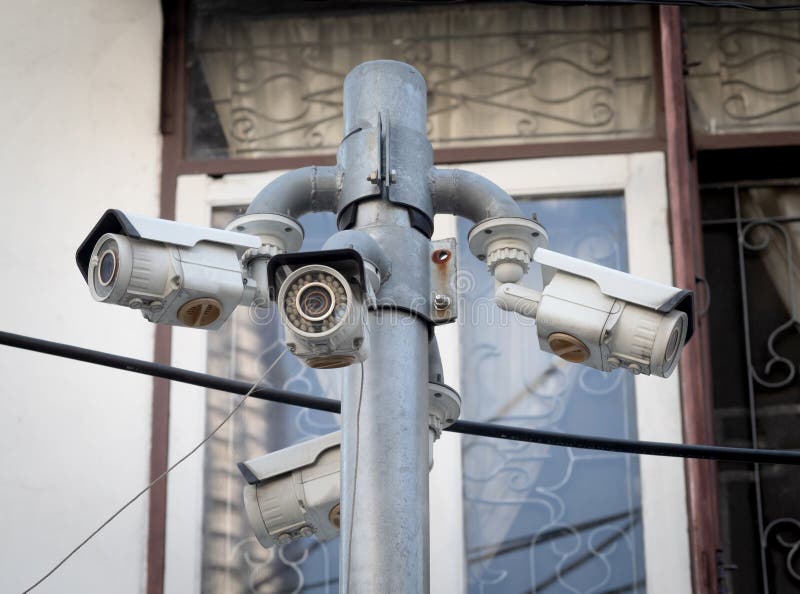 Old Security Camera or CCTV Installed on the House Roof. Stock Image ...