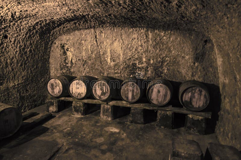 Old Cellar with Bottles and Barrels Under Castle Making Wine Stock ...