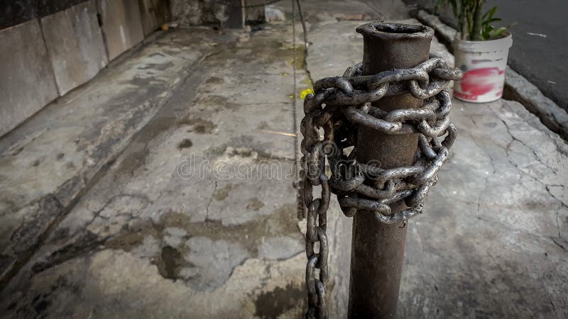 Old Chain on the Pole stock image. Image of brown, metallic - 138244537