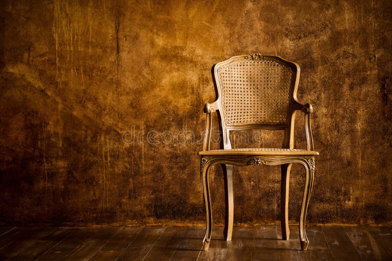 Old Chair on a Brown Wall Background. Stock Image - Image of indoors ...