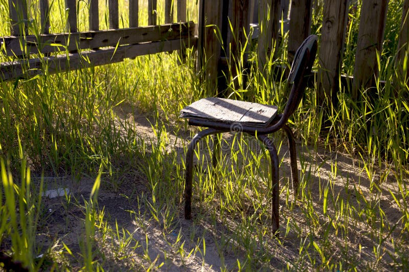 Old Chair Outdoor with Green Grass Stock Photo - Image of green, fence ...