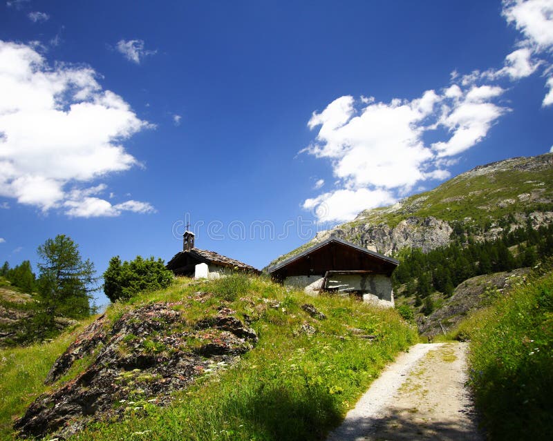 Old Chapel and Alps in Summer Stock Photo - Image of culture, legacy ...