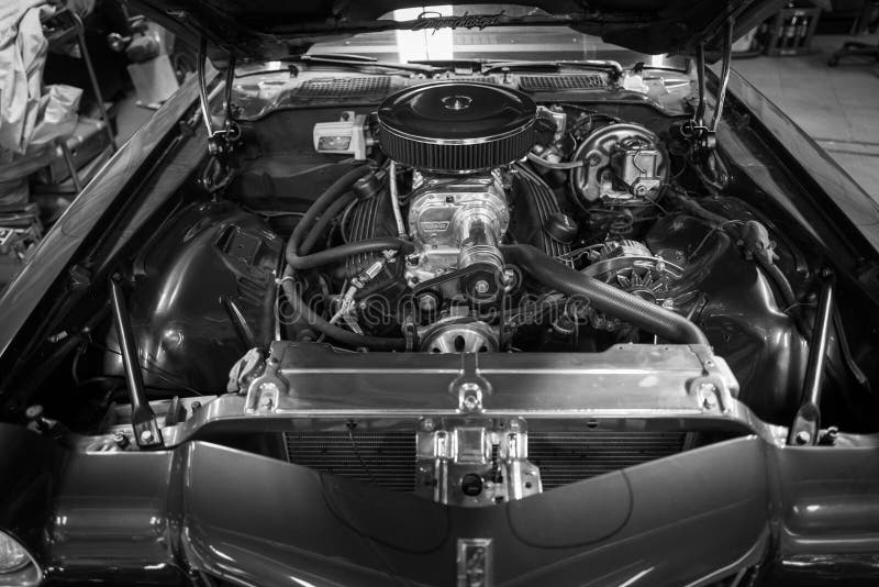 An Old Cheverolet with Open Engine Hood Stands in a Workshop Editorial ...