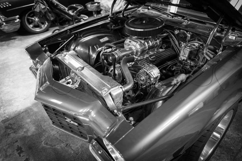 An Old Cheverolet with Open Engine Hood Stands in a Workshop Editorial ...