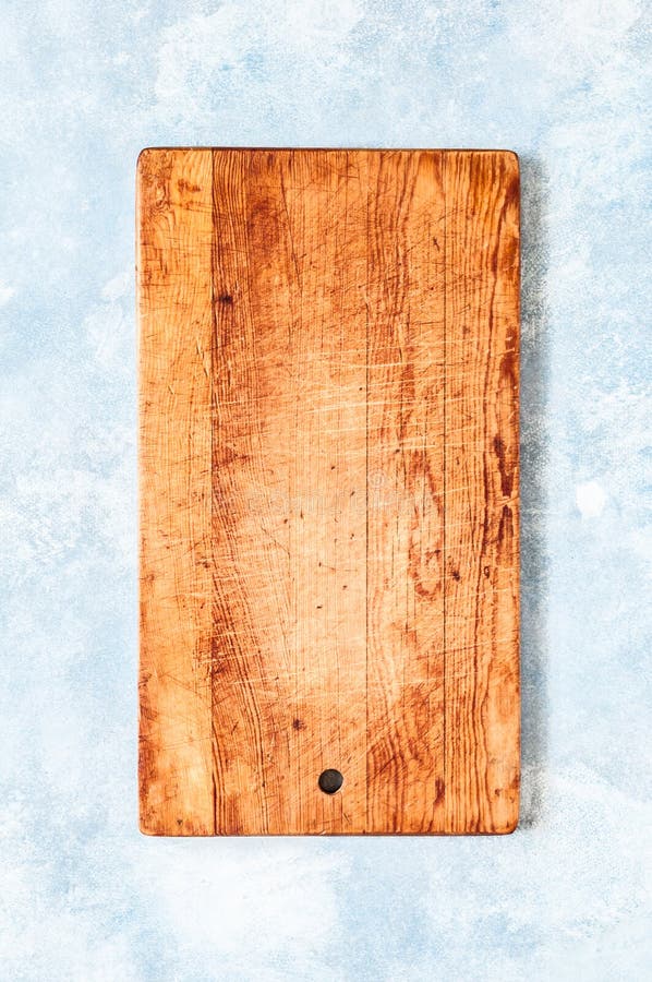 Old Chopping Board on Blue Background Stock Image - Image of ...