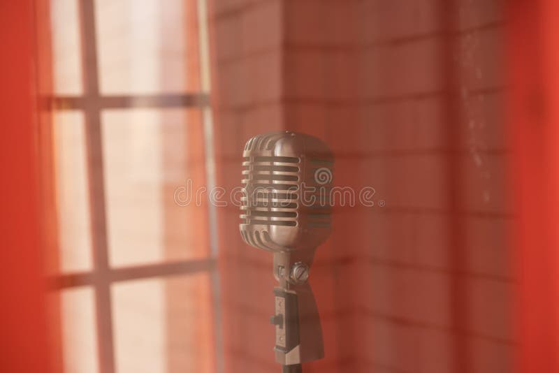 Old Chrome Microphone Isolated in Classic British Red Phone Booth Stock ...
