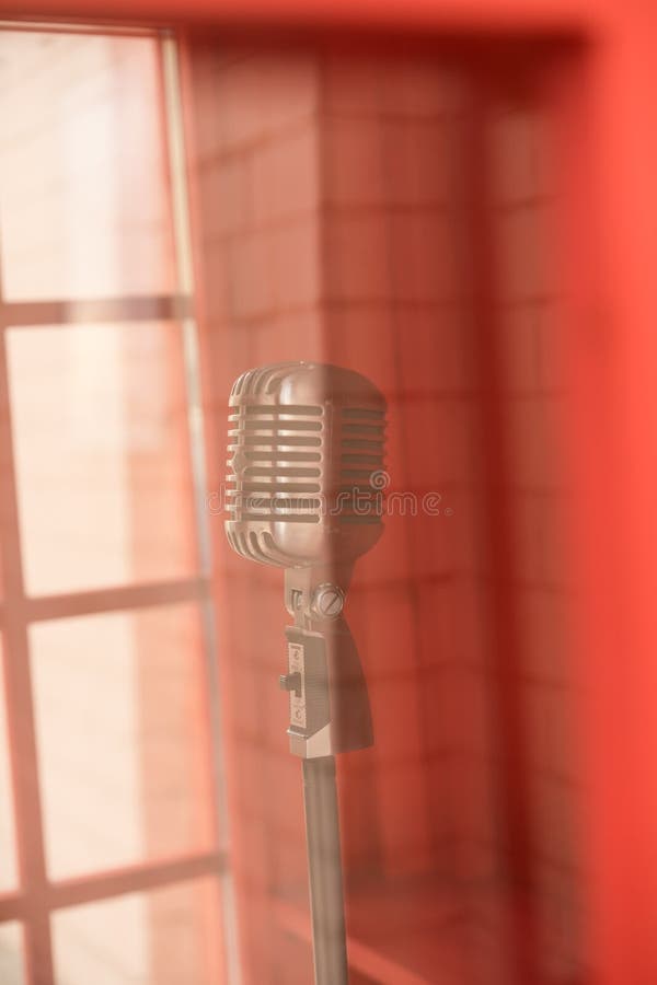 Old Chrome Microphone Isolated in Classic British Red Phone Booth Stock ...