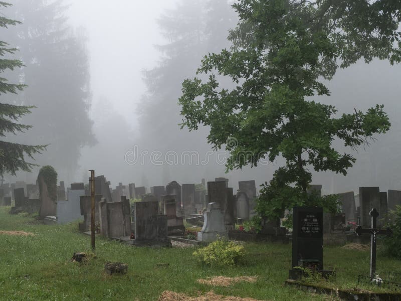 Old Church with Cemetery in Misty Weather Stock Photo - Image of ...