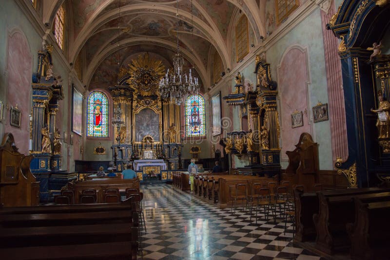 Old Church in Krakow, Poland with People Inside Editorial Stock Photo ...