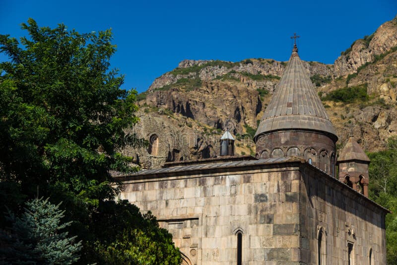Old Church Surrounded by Trees and a Mountain Background Stock Photo ...