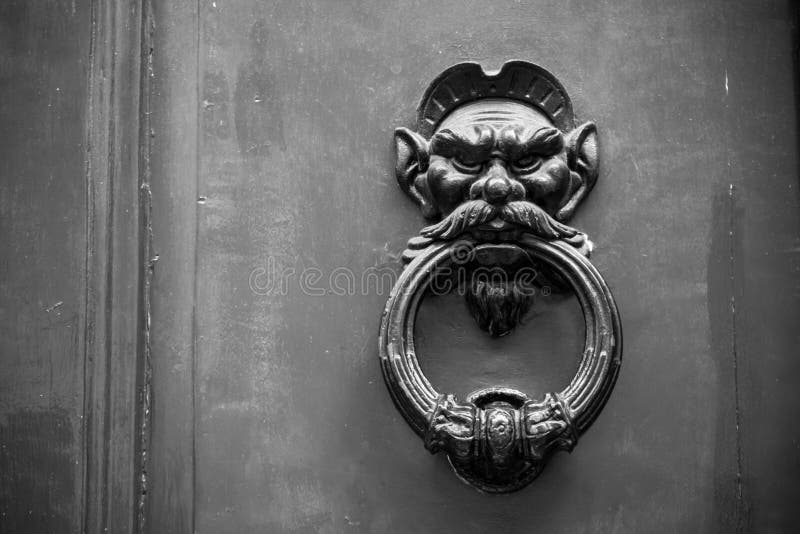 Old Clapper on Wooden Old Door Stock Image - Image of ornament, closeup ...