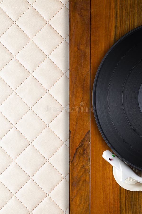 Old Classic Wooden Record Player and Vinyl Record on Leather Background ...