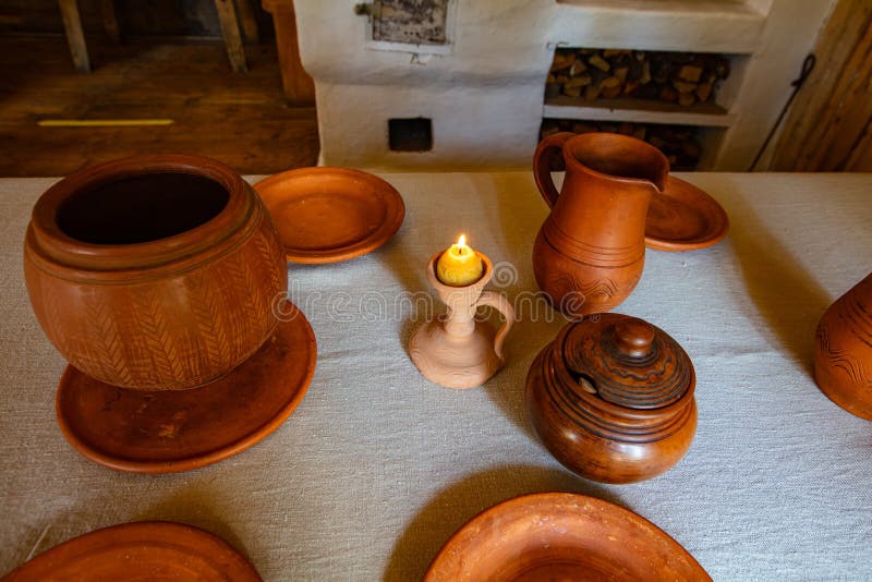 Old Clay Dishware on the Table Editorial Image - Image of material ...