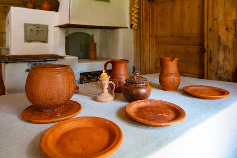 Old Clay Dishware on the Table Stock Photo - Image of dishware ...