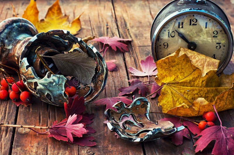 Old Clock on the Background of Fallen Leaves Stock Image - Image of ...