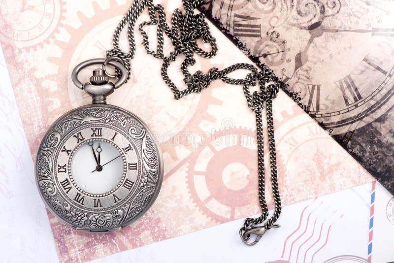 Old Clock With Chain Lying On Rough Green Surface Stock Image - Image ...