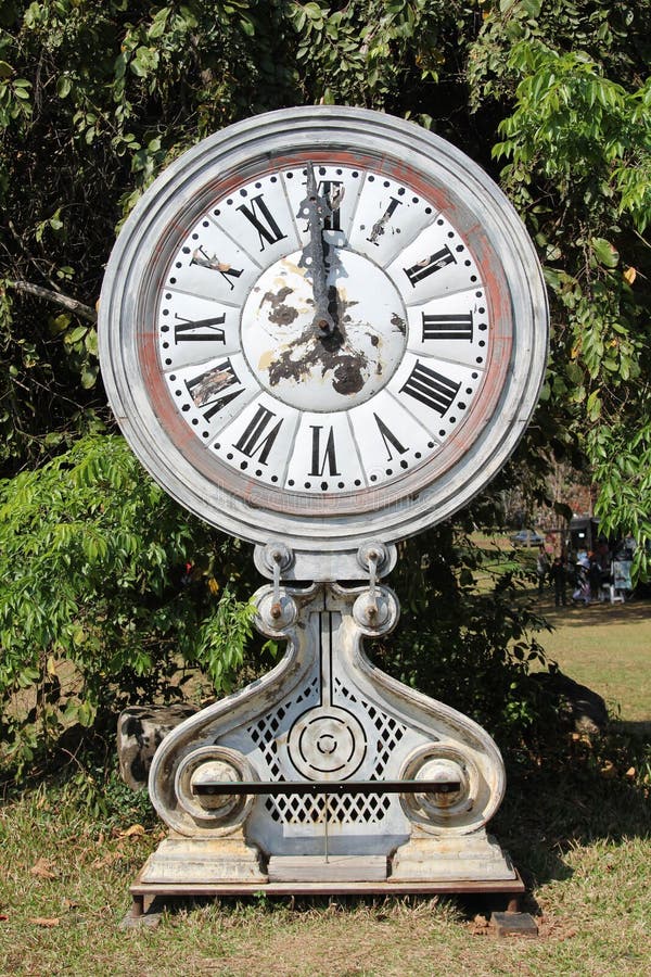 Old clock in garden stock photo. Image of outdoor, landscape - 223917114