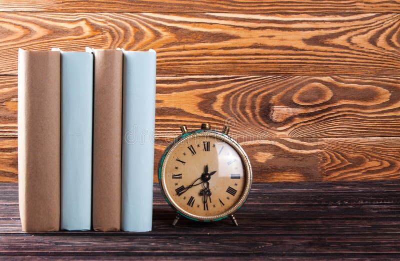 Old Clock and Stack of Old Books Stock Image - Image of knowledge, open ...