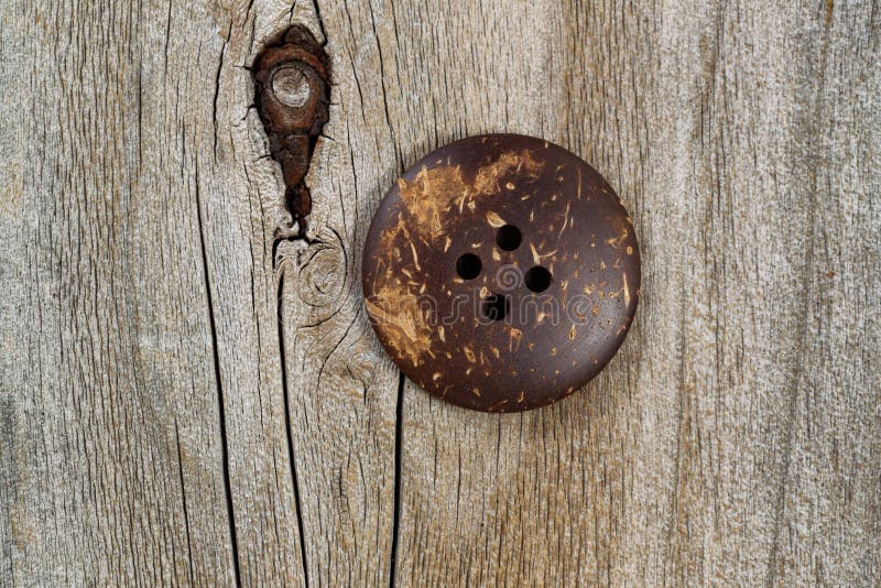 Old Clothing Button on Rustic Wood Stock Image - Image of texture ...