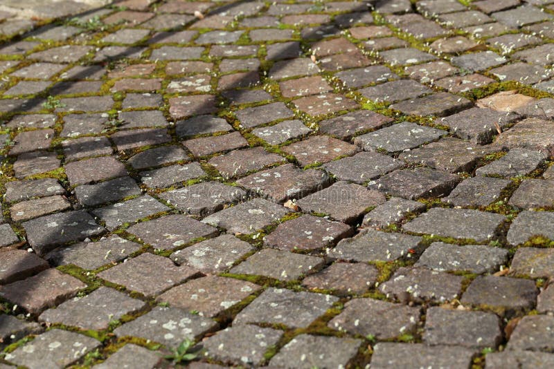 Old Cobbled Surface of the Road in the City Stock Photo - Image of ...