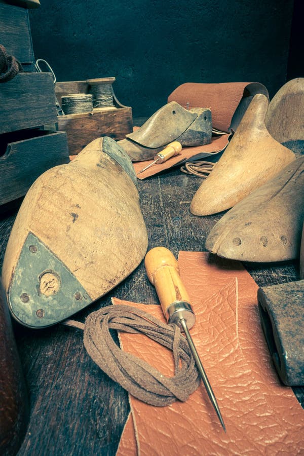 Old Cobbler Workplace with Tools, Laces and Shoes Stock Image - Image ...
