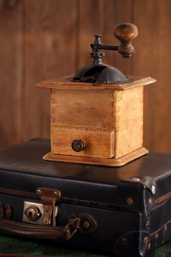 Old Coffee Mill Grinder On Retro Suitcase Stock Photo - Image of heap ...