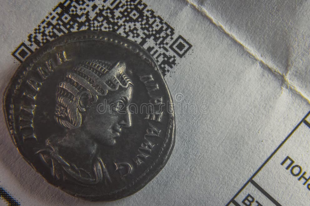 An Old Coin on a Sheet of Paper with a Cuar Code Stock Image - Image of ...