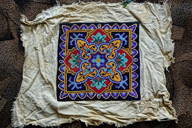 An Old Colored Embroidered Pattern on a Piece of Old Cloth Stock Image ...