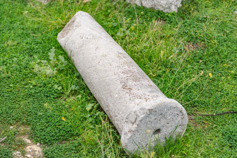 Old column on the grass stock image. Image of outdoor - 220439631