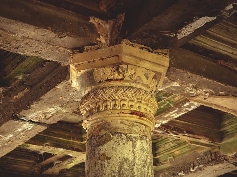 An Old Column with Stucco Inside an Abandoned Room. Closeup Photo Stock ...