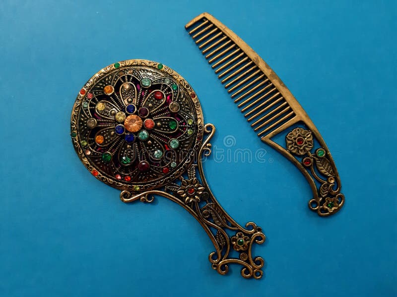 Old comb and mirror stock photo. Image of shadow, bronz - 202653772