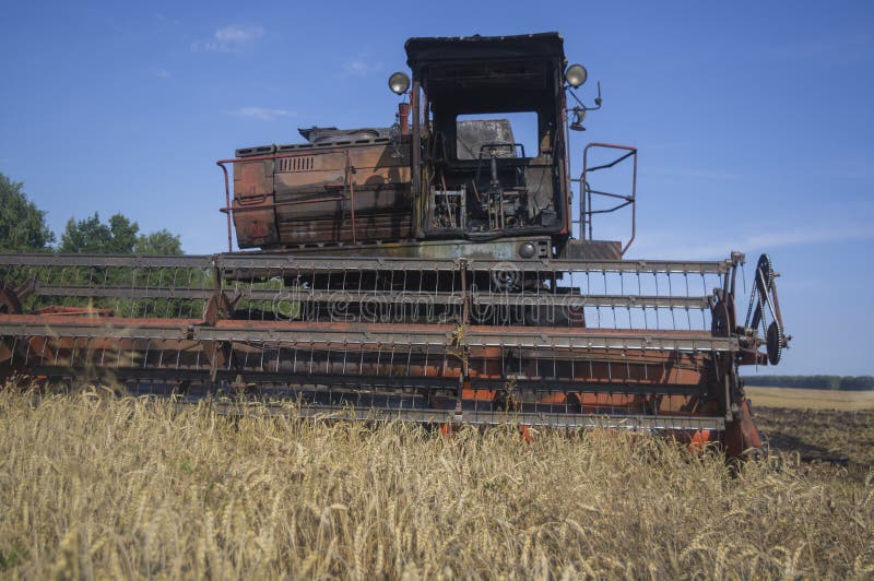 Old Combine Harvester Lighted Up on Harvesting of the Grain 2 Stock ...