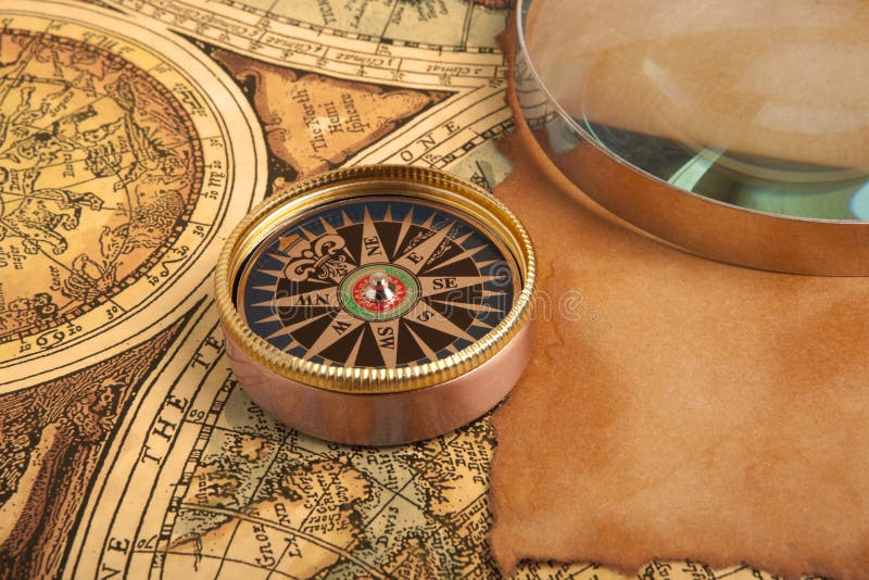 Vintage Compass Lies on an Ancient World Map. Stock Image - Image of ...