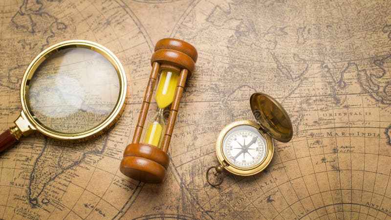 Old Compass , Magnifying Glass and Sand Clock on Vintage Map Stock ...