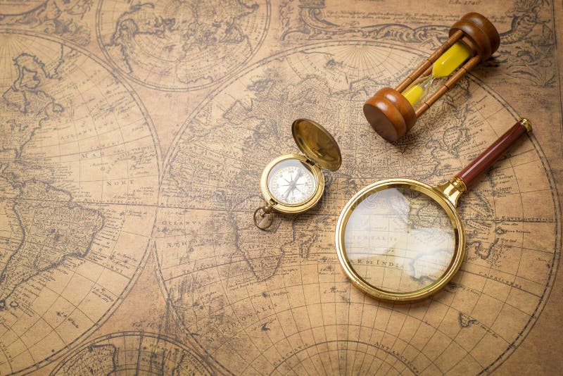 Old Compass , Magnifying Glass and Sand Clock on Vintage Map Stock ...
